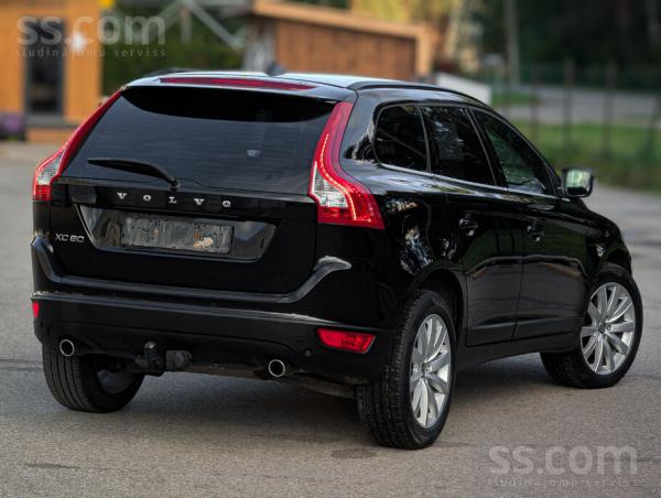 Black Volvo XC60 2012 in Jurmala, with an engine capacity of 2.40 L and mileage of 0 thousand km for 7650 €, photo 4 on AUTOMOTO.COM.LV