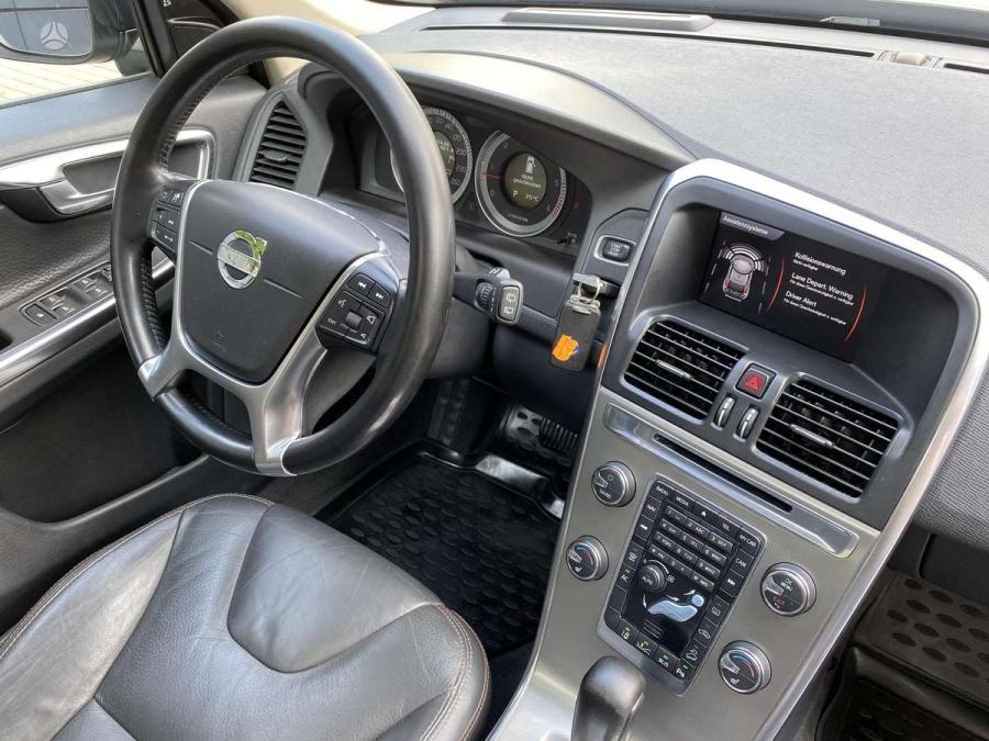 Black Volvo XC60 2012 in Marijampole, with an engine capacity of 2.40 L and mileage of 245 thousand km for 11450 €, photo 28 on AUTOMOTO.COM.LV