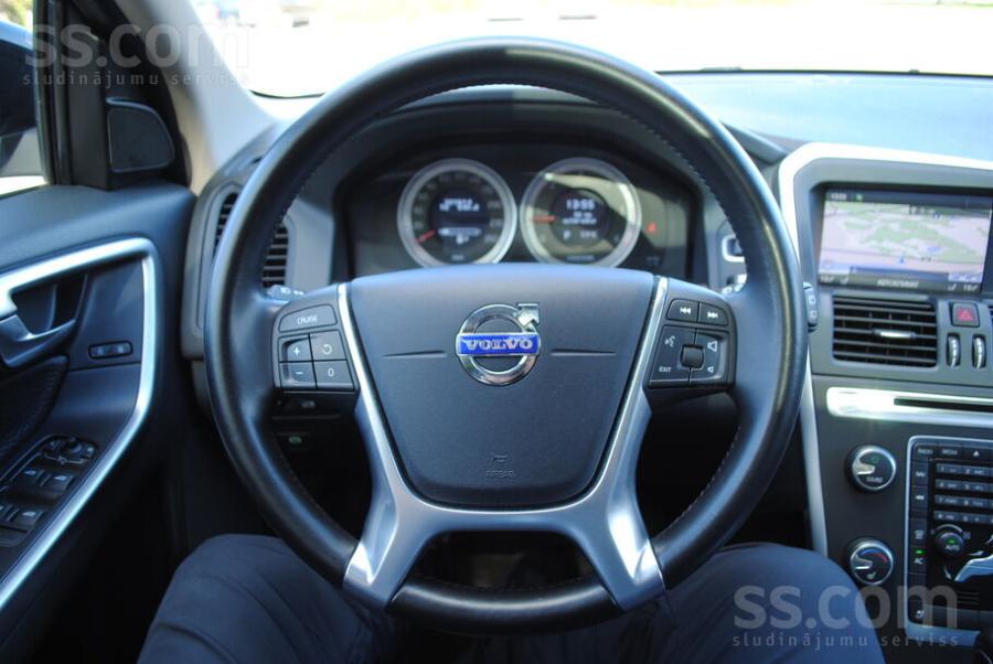 Black Volvo XC60 2012 in Riga, with an engine capacity of 2.40 L and mileage of 302 thousand km for 9990 €, photo 23 on AUTOMOTO.COM.LV