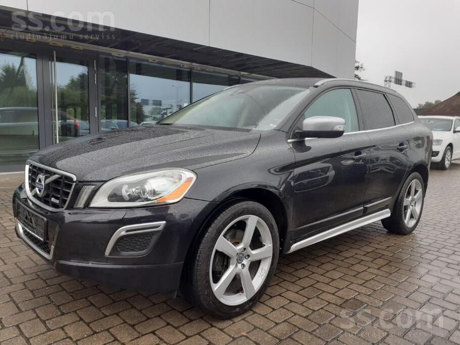 Black Volvo XC60 2012 in Riga, with an engine capacity of 2.40 L and mileage of 216 thousand km for 12800 €, photo 1 on AUTOMOTO.COM.LV