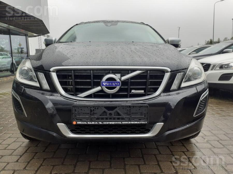 Black Volvo XC60 2012 in Riga, with an engine capacity of 2.40 L and mileage of 216 thousand km for 12800 €, photo 14 on AUTOMOTO.COM.LV