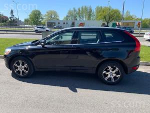 Black Volvo XC60 2013 in Riga, with an engine capacity of 2.40 L and mileage of 330 thousand km for 4700 €, photo 2 on AUTOMOTO.COM.LV