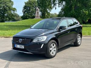 Black Volvo XC60 2013 in Riga, with an engine capacity of 2.00 L and mileage of 305 thousand km for 8350 €, photo 1 on AUTOMOTO.COM.LV
