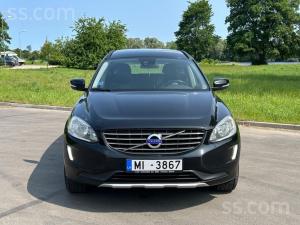 Black Volvo XC60 2013 in Riga, with an engine capacity of 2.00 L and mileage of 305 thousand km for 8350 €, photo 2 on AUTOMOTO.COM.LV