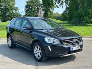 Black Volvo XC60 2013 in Riga, with an engine capacity of 2.00 L and mileage of 305 thousand km for 8350 €, photo 3 on AUTOMOTO.COM.LV