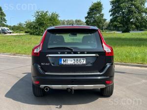 Black Volvo XC60 2013 in Riga, with an engine capacity of 2.00 L and mileage of 305 thousand km for 8350 €, photo 5 on AUTOMOTO.COM.LV