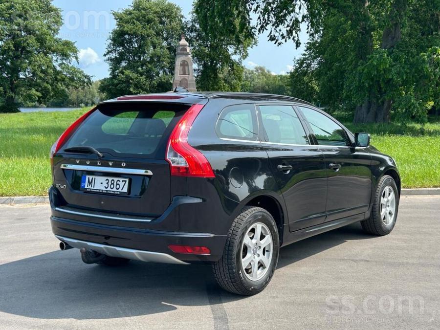 Black Volvo XC60 2013 in Riga, with an engine capacity of 2.00 L and mileage of 305 thousand km for 8350 €, photo 6 on AUTOMOTO.COM.LV