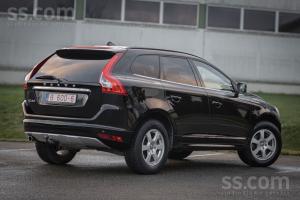 Black Volvo XC60 2013 in Tukums, with an engine capacity of 2.00 L and mileage of 257 thousand km for 10990 €, photo 12 on AUTOMOTO.COM.LV