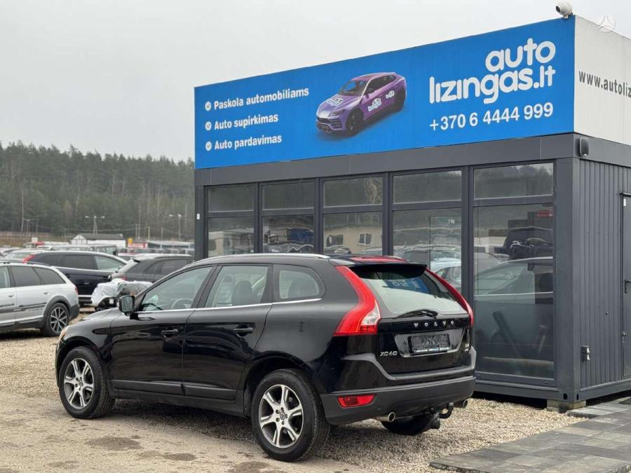 Black Volvo XC60 2013 in Vilnius, with an engine capacity of 2.40 L and mileage of 195 thousand km for 9350 €, photo 3 on AUTOMOTO.COM.LV