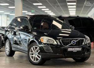 Black Volvo XC60 2013 in Klaipeda, with an engine capacity of 2.40 L and mileage of 238 thousand km for 13500 €, photo 9 on AUTOMOTO.COM.LV