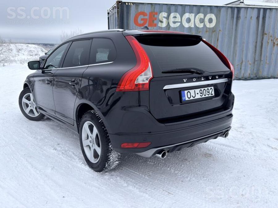 Black Volvo XC60 2013 in Riga, with an engine capacity of 2.40 L and mileage of 217 thousand km for 14495 €, photo 2 on AUTOMOTO.COM.LV