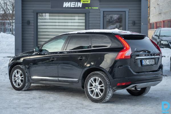 Black Volvo XC60 2013 in Liepaja, with an engine capacity of 2.00 L and mileage of 297 thousand km for 10350 €, photo 2 on AUTOMOTO.COM.LV