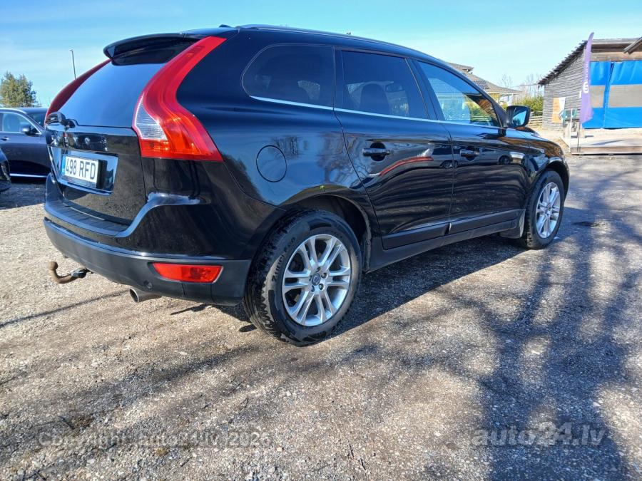 Black Volvo XC60 2013 in Tartu, with an engine capacity of 2.40 L and mileage of 325 thousand km for 8490 €, photo 6 on AUTOMOTO.COM.LV