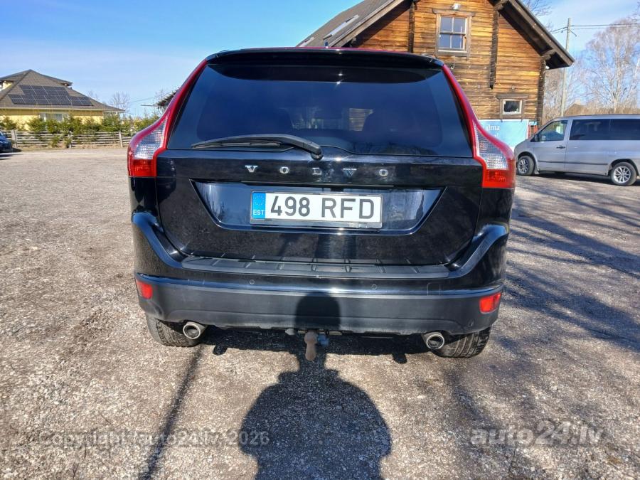Black Volvo XC60 2013 in Tartu, with an engine capacity of 2.40 L and mileage of 325 thousand km for 8490 €, photo 7 on AUTOMOTO.COM.LV