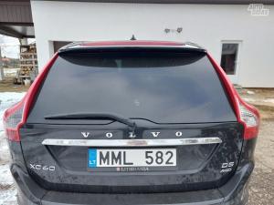Black Volvo XC60 2013 in Jonava, with an engine capacity of 2.40 L and mileage of 254 thousand km for 13500 €, photo 4 on AUTOMOTO.COM.LV