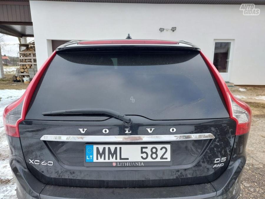 Black Volvo XC60 2013 in Jonava, with an engine capacity of 2.40 L and mileage of 254 thousand km for 13500 €, photo 4 on AUTOMOTO.COM.LV