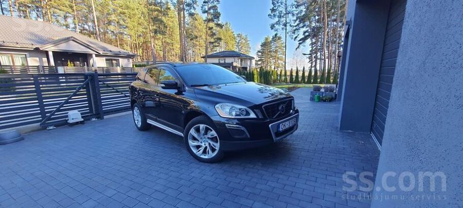 Black Volvo XC60 2013 in Riga, with an engine capacity of 2.40 L and mileage of 285 thousand km for 8500 €, photo 1 on AUTOMOTO.COM.LV