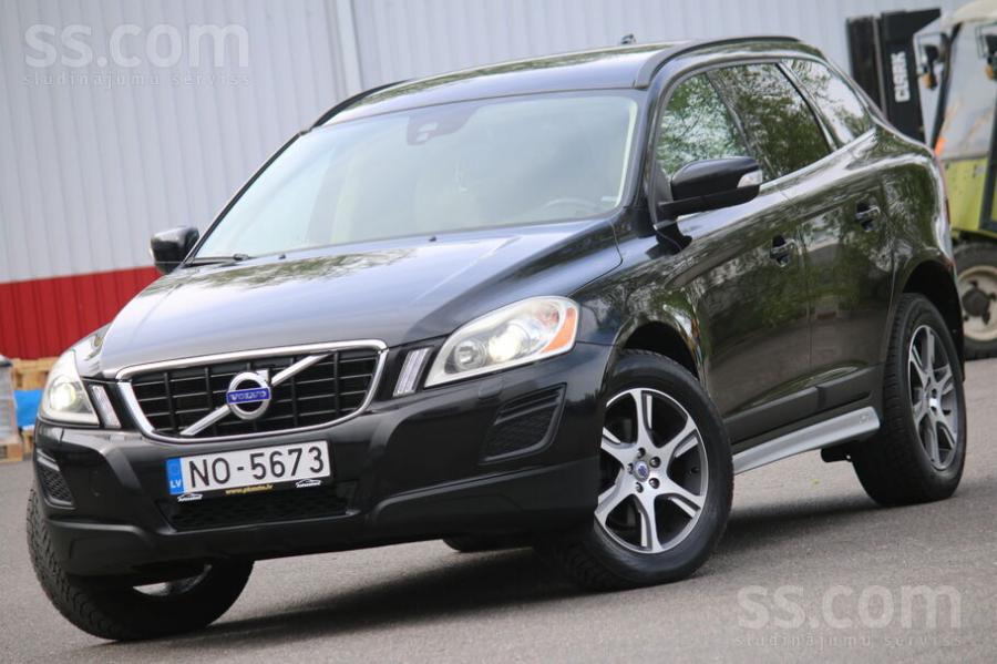 Black Volvo XC60 2013 in Riga, with an engine capacity of 2.00 L and mileage of 262 thousand km for 5990 €, photo 1 on AUTOMOTO.COM.LV