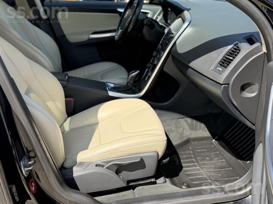 Black Volvo XC60 2013 in Riga, with an engine capacity of 2.40 L and mileage of 272 thousand km for 9500 €, photo 13 on AUTOMOTO.COM.LV