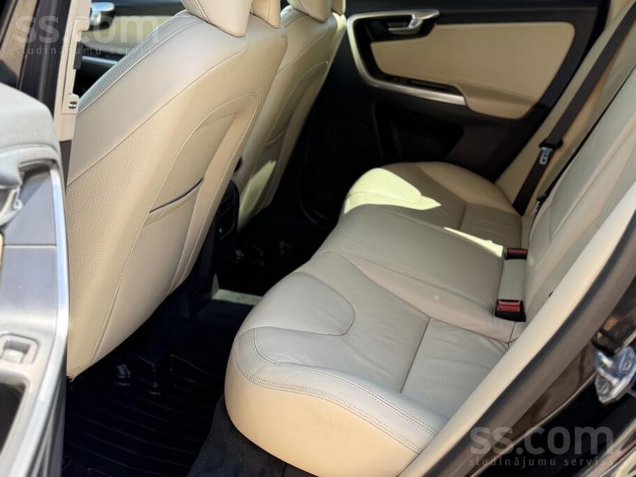 Black Volvo XC60 2013 in Riga, with an engine capacity of 2.40 L and mileage of 272 thousand km for 9500 €, photo 14 on AUTOMOTO.COM.LV