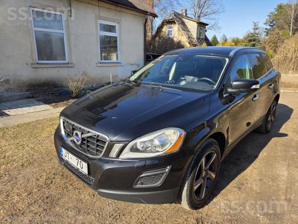 Black Volvo XC60 2013 in Ogre, with an engine capacity of 2.40 L and mileage of 307 thousand km for 10700 €, photo 1 on AUTOMOTO.COM.LV