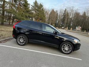 Black Volvo XC60 2013 in Riga, with an engine capacity of 2.00 L and mileage of 283 thousand km for 10190 €, photo 5 on AUTOMOTO.COM.LV