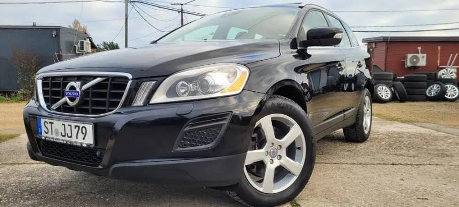 Black Volvo XC60 2013 in Riga, with an engine capacity of 2.40 L and mileage of 235 thousand km for 11990 €, photo 1 on AUTOMOTO.COM.LV
