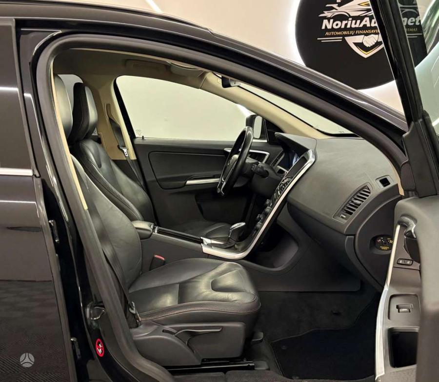 Black Volvo XC60 2013 in Marijampole, with an engine capacity of 2.40 L and mileage of 240 thousand km for 11950 €, photo 10 on AUTOMOTO.COM.LV
