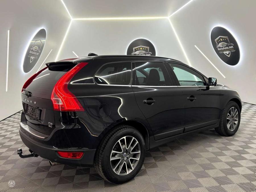 Black Volvo XC60 2013 in Marijampole, with an engine capacity of 2.40 L and mileage of 240 thousand km for 11950 €, photo 23 on AUTOMOTO.COM.LV