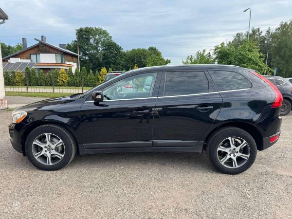 Black Volvo XC60 2013 in Jurbarkas, with an engine capacity of 1.98 L and mileage of 195 thousand km for 9950 €, photo 1 on AUTOMOTO.COM.LV