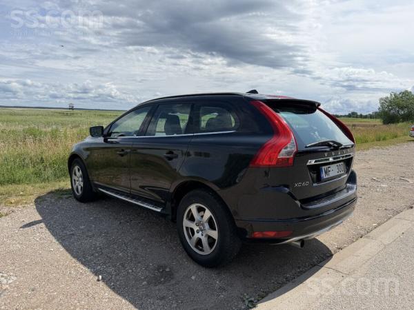 Black Volvo XC60 2013 in Liepaja, with an engine capacity of 2.00 L and mileage of 215 thousand km for 10000 €, photo 6 on AUTOMOTO.COM.LV