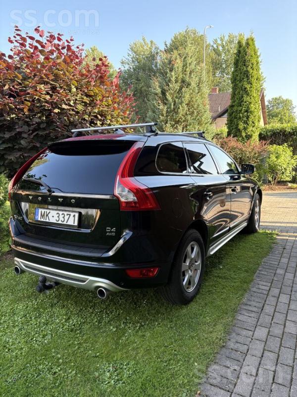Black Volvo XC60 2013 in Riga, with an engine capacity of 2.40 L and mileage of 171 thousand km for 13500 €, photo 2 on AUTOMOTO.COM.LV