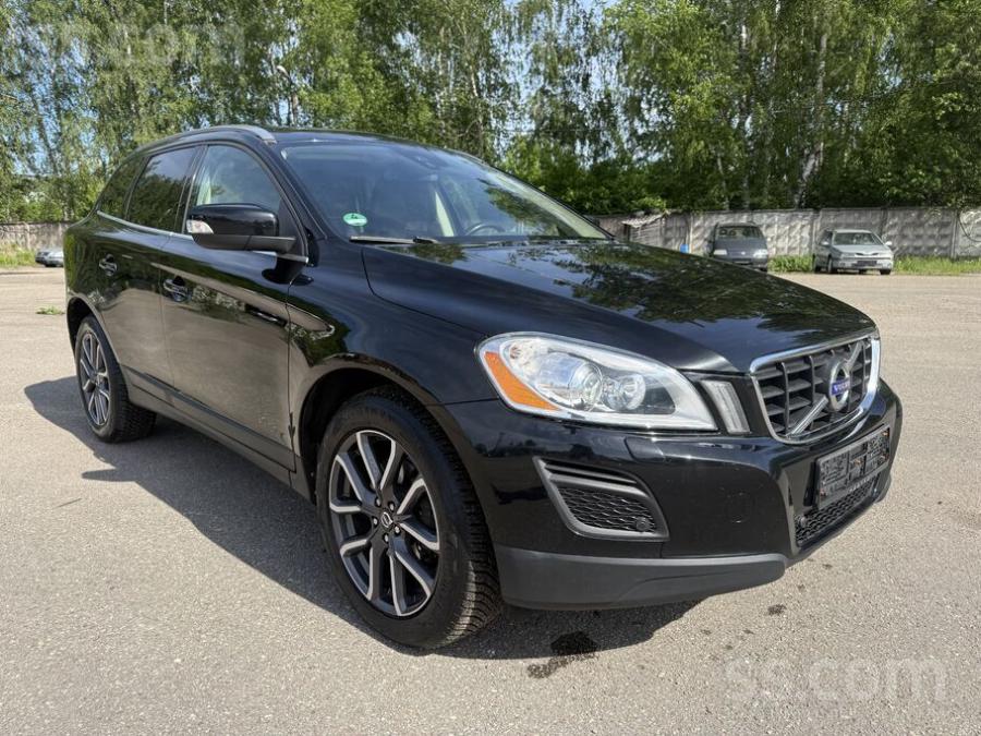 Black Volvo XC60 2013 in Riga, with an engine capacity of 2.40 L and mileage of 279 thousand km for 10380 €, photo 1 on AUTOMOTO.COM.LV