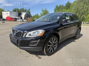 Black Volvo XC60 2013 in Riga, with an engine capacity of 2.40 L and mileage of 279 thousand km for 10380 €, photo 3 on AUTOMOTO.COM.LV