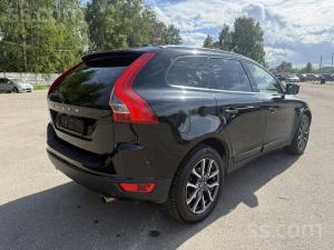Black Volvo XC60 2013 in Riga, with an engine capacity of 2.40 L and mileage of 279 thousand km for 10380 €, photo 5 on AUTOMOTO.COM.LV