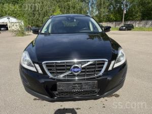 Black Volvo XC60 2013 in Riga, with an engine capacity of 2.40 L and mileage of 279 thousand km for 10380 €, photo 6 on AUTOMOTO.COM.LV