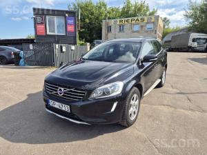 Black Volvo XC60 2013 in Riga, with an engine capacity of 2.00 L and mileage of 215 thousand km for 9990 €, photo  on AUTOMOTO.COM.LV