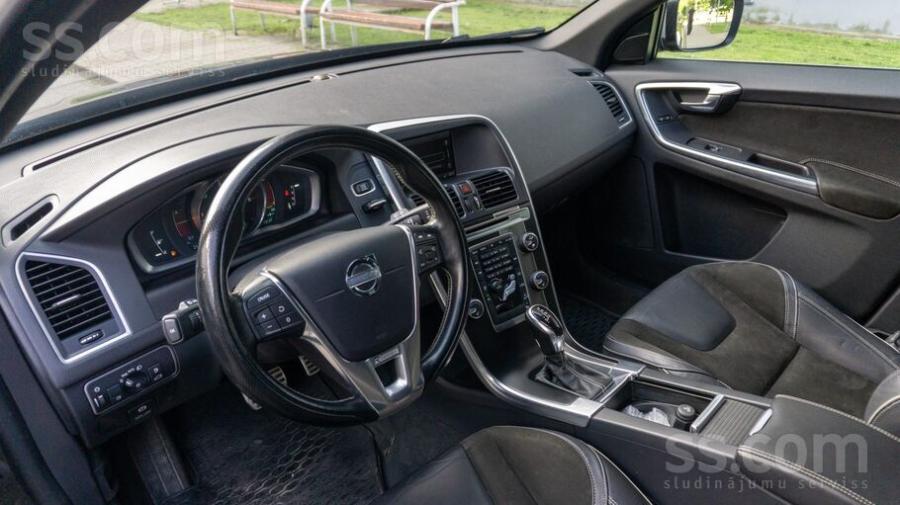Black Volvo XC60 2013 in Riga, with an engine capacity of 2.40 L and mileage of 338 thousand km for 11490 €, photo 11 on AUTOMOTO.COM.LV