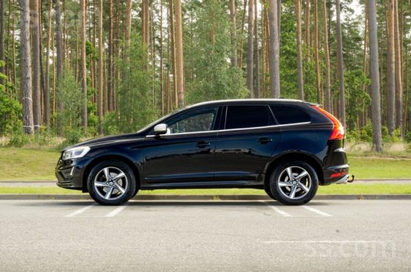Black Volvo XC60 2013 in Riga, with an engine capacity of 2.40 L and mileage of 338 thousand km for 11490 €, photo 5 on AUTOMOTO.COM.LV