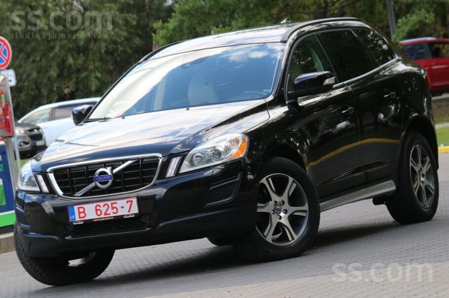Black Volvo XC60 2013 in Riga, with an engine capacity of 2.00 L and mileage of 263 thousand km for 7990 €, photo 1 on AUTOMOTO.COM.LV