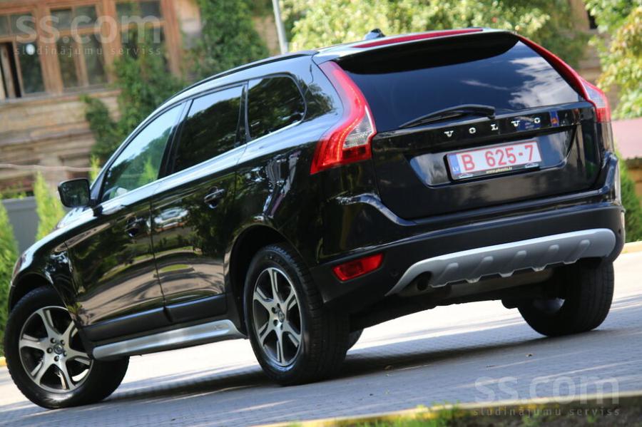 Black Volvo XC60 2013 in Riga, with an engine capacity of 2.00 L and mileage of 263 thousand km for 7990 €, photo 5 on AUTOMOTO.COM.LV
