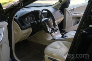 Black Volvo XC60 2013 in Riga, with an engine capacity of 2.00 L and mileage of 263 thousand km for 7990 €, photo 8 on AUTOMOTO.COM.LV