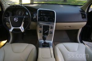 Black Volvo XC60 2013 in Riga, with an engine capacity of 2.00 L and mileage of 263 thousand km for 7990 €, photo 12 on AUTOMOTO.COM.LV