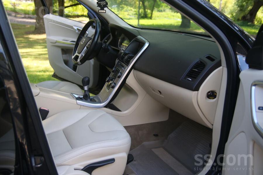 Black Volvo XC60 2013 in Riga, with an engine capacity of 2.00 L and mileage of 263 thousand km for 7990 €, photo 18 on AUTOMOTO.COM.LV