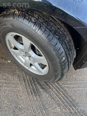Black Volvo XC60 2013 in Daugavpils, with an engine capacity of 2.00 L and mileage of 231 thousand km for 9500 €, photo 14 on AUTOMOTO.COM.LV
