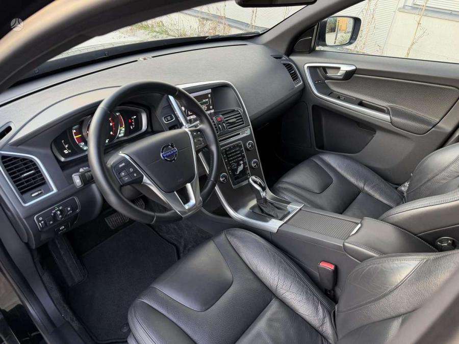 Black Volvo XC60 2013 in Utena, with an engine capacity of 2.40 L and mileage of 308 thousand km for 12250 €, photo 56 on AUTOMOTO.COM.LV