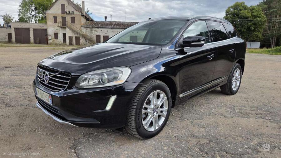 Black Volvo XC60 2013 in Kaunas, with an engine capacity of 2.40 L and mileage of 238 thousand km for 13100 €, photo 4 on AUTOMOTO.COM.LV