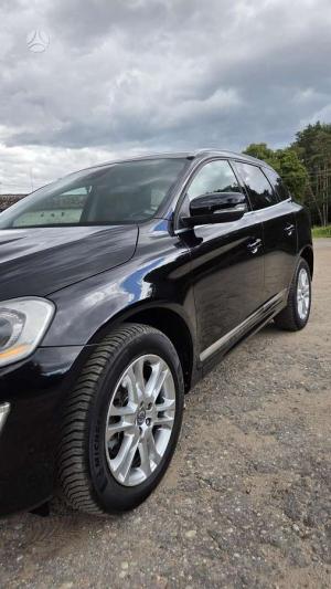 Black Volvo XC60 2013 in Kaunas, with an engine capacity of 2.40 L and mileage of 238 thousand km for 13100 €, photo 5 on AUTOMOTO.COM.LV