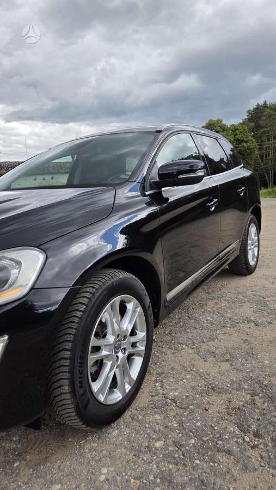 Black Volvo XC60 2013 in Kaunas, with an engine capacity of 2.40 L and mileage of 238 thousand km for 13100 €, photo 5 on AUTOMOTO.COM.LV