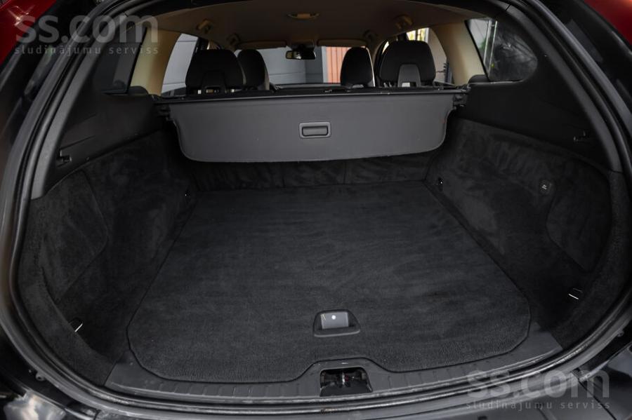 Black Volvo XC60 2013 in Jelgava, with an engine capacity of 2.40 L and mileage of 0 thousand km for 6400 €, photo 12 on AUTOMOTO.COM.LV